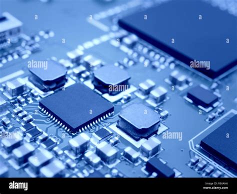 Closeup Image Of Microprocessor On Electronic Circuit Board Blurred