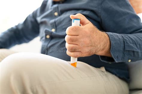 Man Injecting Epinephrine Using Auto Injector Syringe Stock Image Image Of Shock Anaphylactic