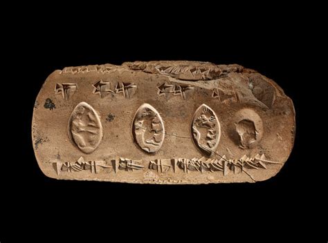 Edge Of Cuneiform Tablet With Four Seal Impressions From Left Two Download Scientific Diagram