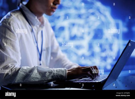 Computer Scientist In Data Center Uses Artificial Intelligence