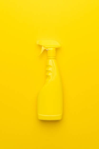 Premium Photo Yellow Cleaning Spray