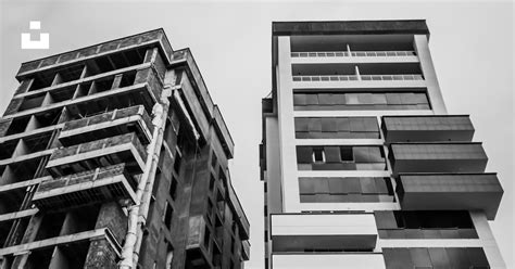 콘크리트 건물의 그레이스케일 사진 사진 Unsplash의 무료 회색 이미지