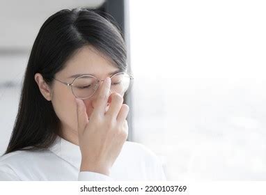 Asian Woman Pushes Her Glasses Stock Photo 2200103769 Shutterstock