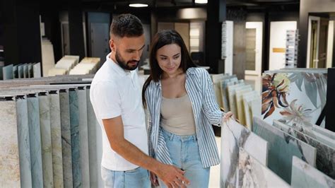 Couple Selecting Tiles For Home Decor In Store 55583186 Stock Video At Vecteezy
