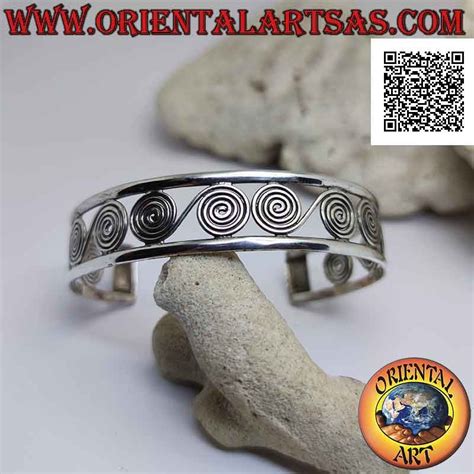 Bracelet Rigide En Argent 925 ‰ Ajouré Une Succession De Spirales Grecques Entre Deux Lignes Douces