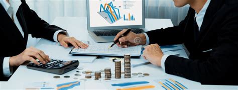 Business Intelligence Analyst Use Bi Software On Laptop With Stack Coin