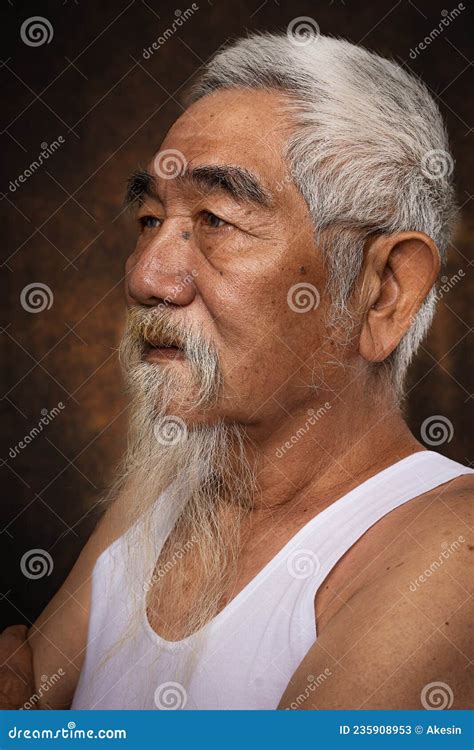Studio Head Shot Portrait Of Chinese Old Man With White Hair And Beard