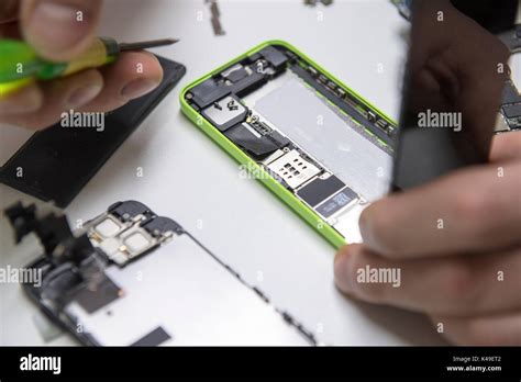 Someone Repairing A Cell Phone Stock Photo Alamy