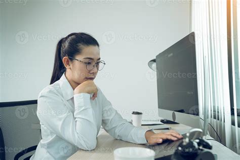 Asian Female Software Developer Is Worried About Analyzing Code Based