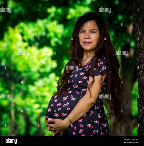 Mexican Mother Posing For A Maternity Photoshoot Stock Photo Alamy