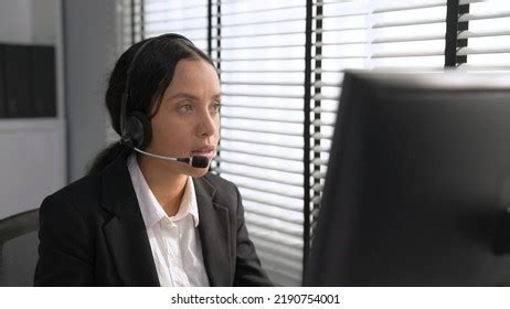 Competent Female Operator Working On Computer Stock Photo 2226918375 Shutterstock