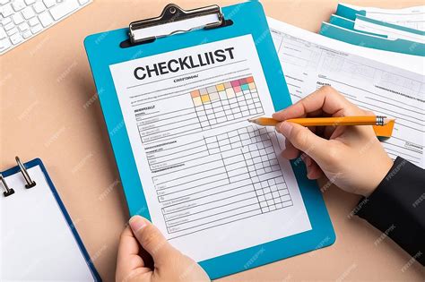 Premium Photo Hand Holding Clipboard With Checklist And Pencil