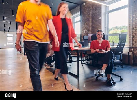 A Diverse Group Of Business Professionals Collaborates In A Modern