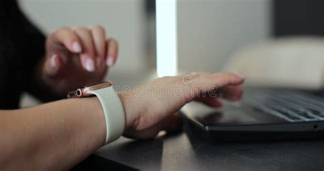 Close Up Of Woman Touching Smart Watch Screen Swiping Device Display In