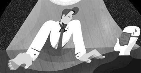 A Man Sitting On The Ground In Front Of A Light