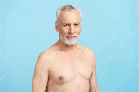 Premium Photo Pensive Seniour Man Standing Isolated On Blue