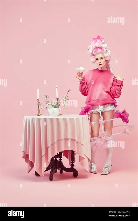 Portrait With Dreaming Princess Wearing Fancy Clothes Holding Cocktail