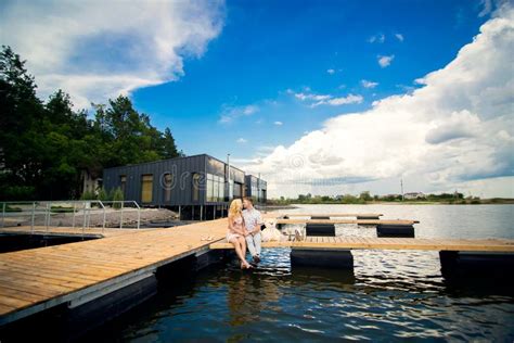 Couple In Love Sitting On The Dock Stock Image Image Of Romance Relaxation 100330105