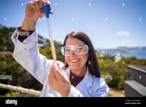 Soil Test Female Agricultural Scientist Conducting A Soil Test In A Scientific Lab In Soil