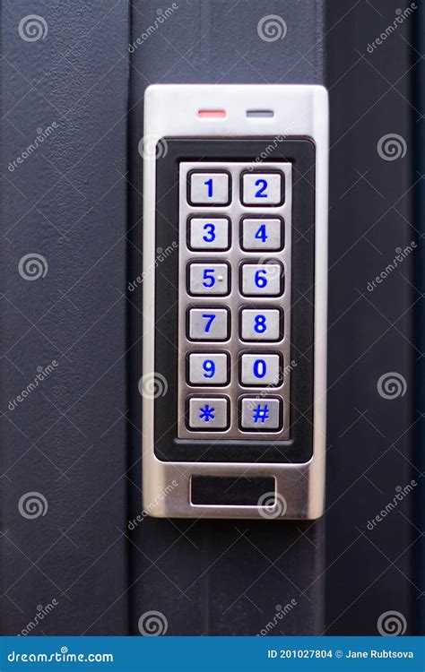 Silver Intercom Call Panel With Number Pins On A Dark Metal Surface Stock Photo Image Of Lock