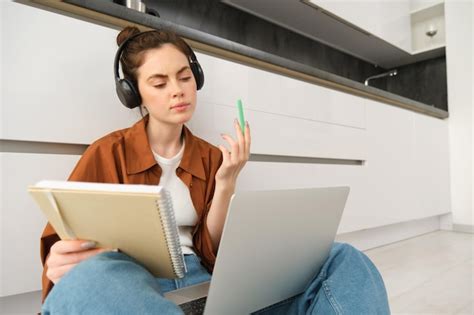 Premium Photo Concentrated Young Student Woman Working On Assignment Doing Homework On Laptop Premium Photo Concentrated Young Student Woman Working On Assignment Doing Homework On Laptop
