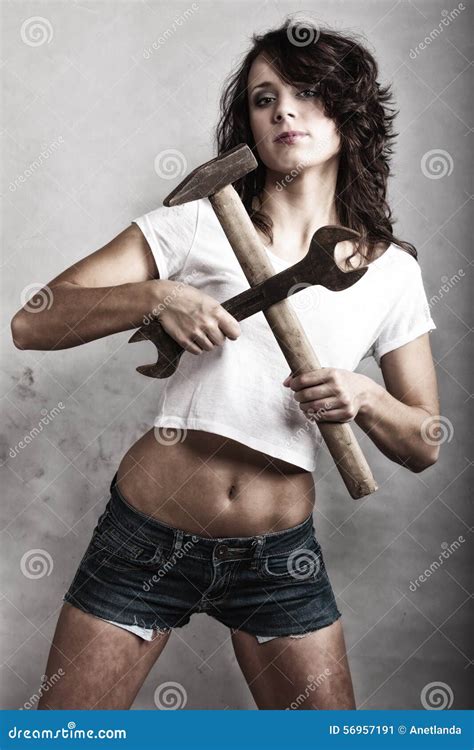Girl Holding Hammer And Wrench Spanner Stock Image Image Of Equipment Spanner 56957191
