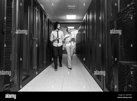 Engineer Showing Working Data Center Server Room To Female Chief Stock Photo Alamy