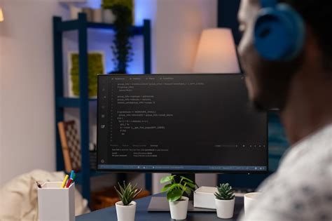 Premium Photo African American Young Developer Programming Software