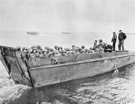 A Platoon Of Us Infantry Being Ferried Out To A Landing Ship In A Lcvp