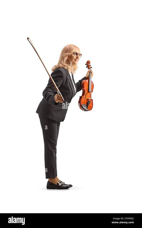 Full Length Shot Of A Female Musician Holding A Violin And A Fiddle And Bowing Isolated On White