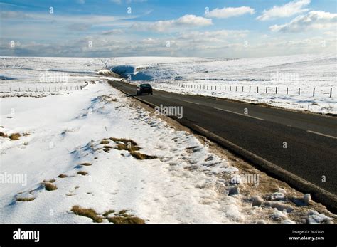 A Car On The A57 Snake Pass Road In Winter Near Glossop Peak District