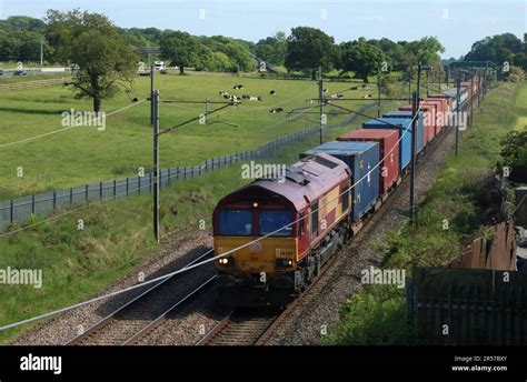 Class 66 Diesel Electric Shed Locomotive On Container Train On West