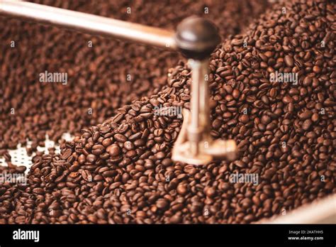 Roasting Coffee Beans In A Professional Old Coffee Roasting Machine Or
