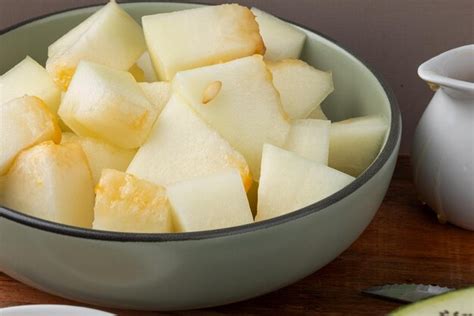 Premium Photo Snap Melon Cubes On Plate Selective Focus