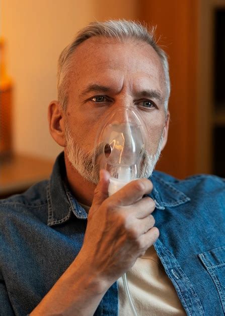Free Photo Medium Shot Man Using Nebulizer