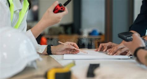 Team Of Young Man And Woman Engineer And Architects Working Meeting Discussing Designing