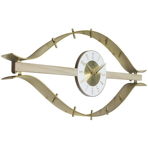 Infinity Instruments Contemporary Gold Metal Eye Shaped Wall Clock 10 In X 22 In Battery