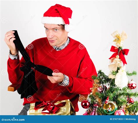 Man Unwrapping A Christmas Gift Stock Image Image Of Decoration Ribbon
