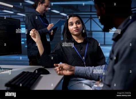 Teamworking Programmers In Data Center Using Diagnostic Tools And System Monitoring Software To