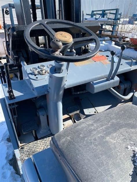1 Preowned Caterpillar Towmotor Straight Mast Forklift With Fork Extensions Model T200 1 Preowned Caterpillar Towmotor Straight Mast Forklift With Fork Extensions Model T200