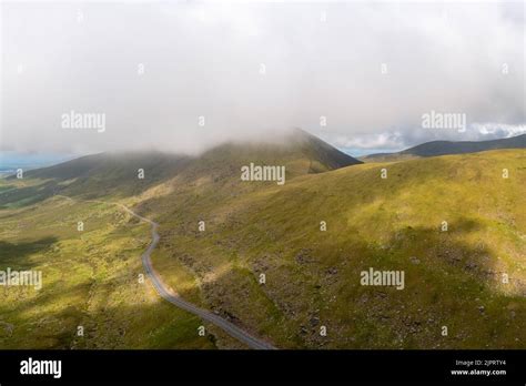 The Steep And Winding Mountain Road Leading To The Top Of Connor Pass