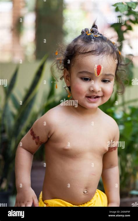 Cute Indian Boy With Holy Religious Symbol On Head At Outdoor With