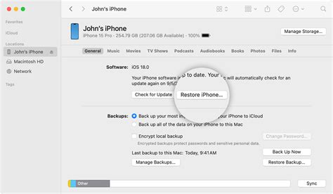 A Finder window showing the option to restore your iPhone