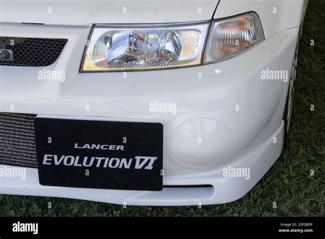 Close Up Of The Front Of A White Mitsubishi Lancer Evolution Vi