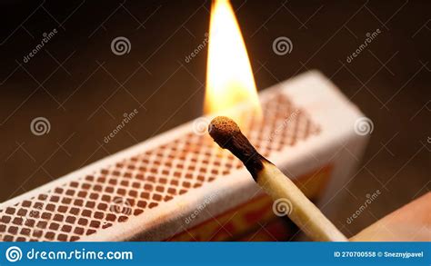 Match Is Lit From A Matchbox Close Up Of A Wooden Match Stock Photo Image Of Flare Ignition