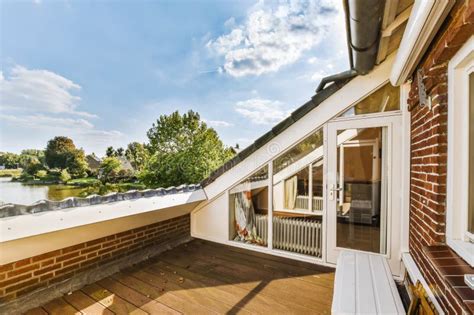 A Balcony with a View of a Body of Water Stock Image - Image of ...