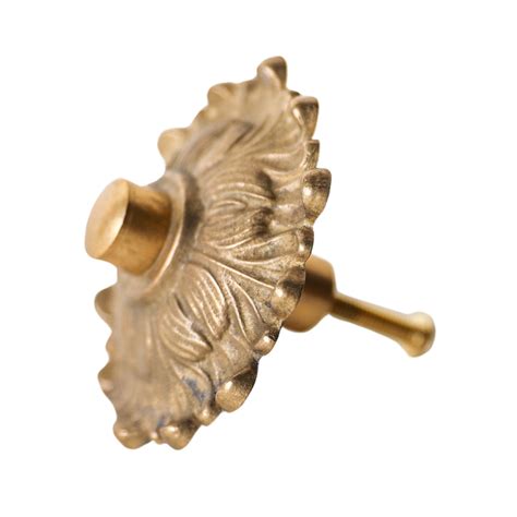 The Soleil Knob Features A Cast Brass Sun Shape With A Modern Cap Adds A Touch Of Regency To
