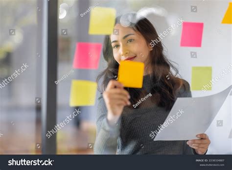 Business Female Employee Many Conflicting Priorities Stock Photo 2238324887 Shutterstock