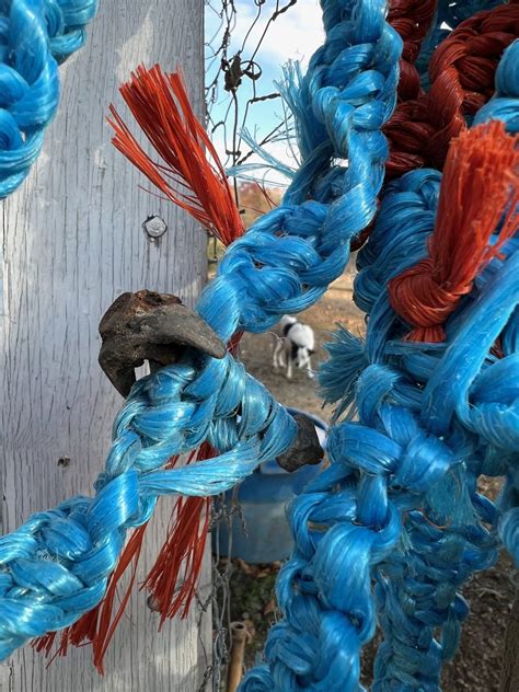 Tying Nails Into My Blue Bailing Twine