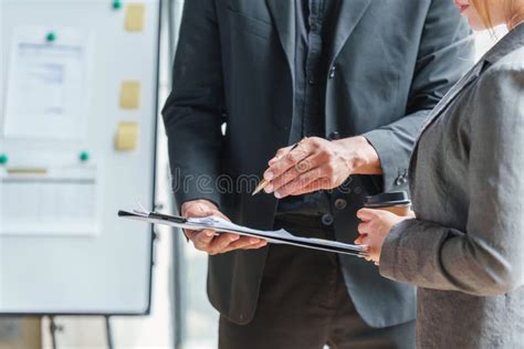 Group Of Business People Meeting For Analysis Data Figures To Plan